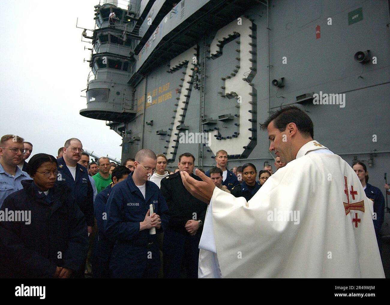 US Navy Navy Chaplain delivers the Catholic Easter communion service on ...