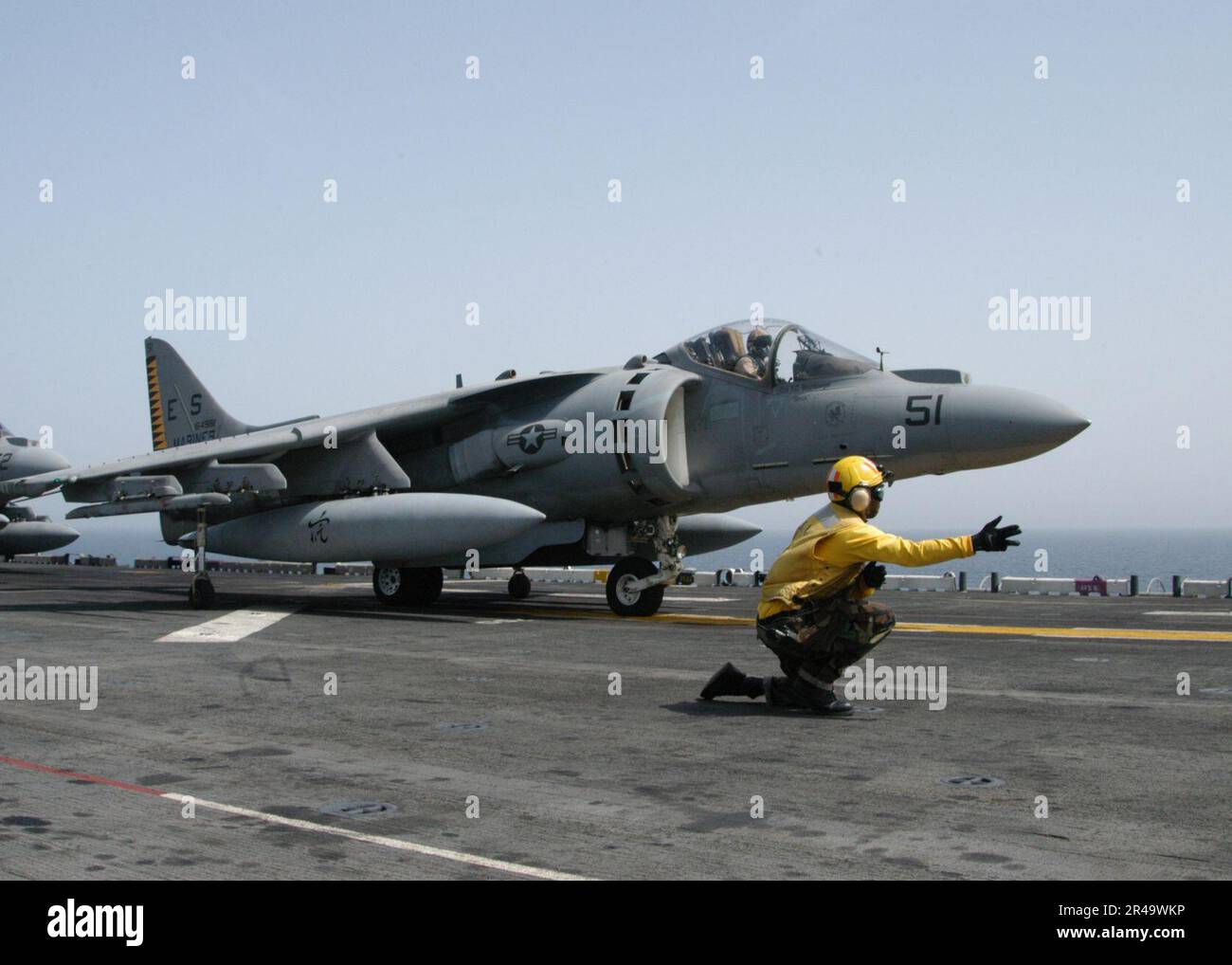 US Navy A plane director assigned to the amphibious assault ship USS ...