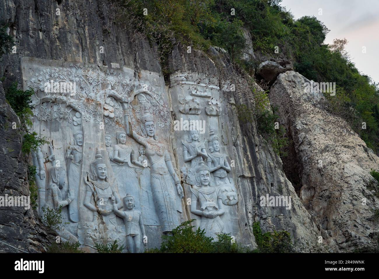 A close-up view of ancient statues adorning the walls of the Bat Cave ...