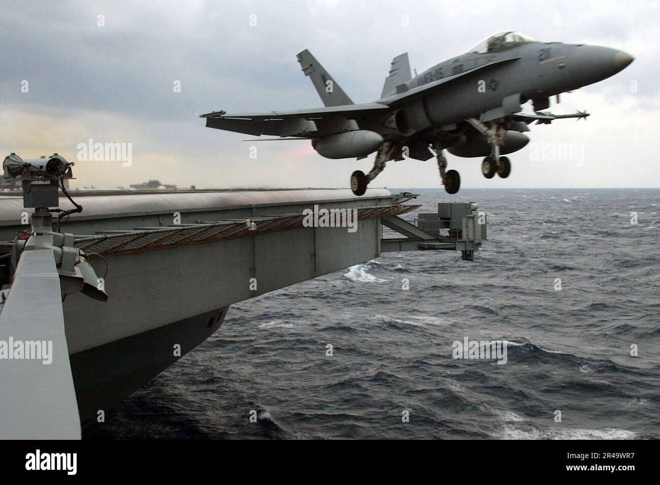 US Navy An F-A-18 Hornet launches from one of the four steam-powered ...