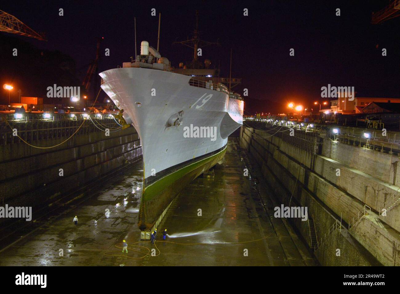 US Navy USS Blue Ridge rests in the Naval Ship Repair Facility dry dock ...