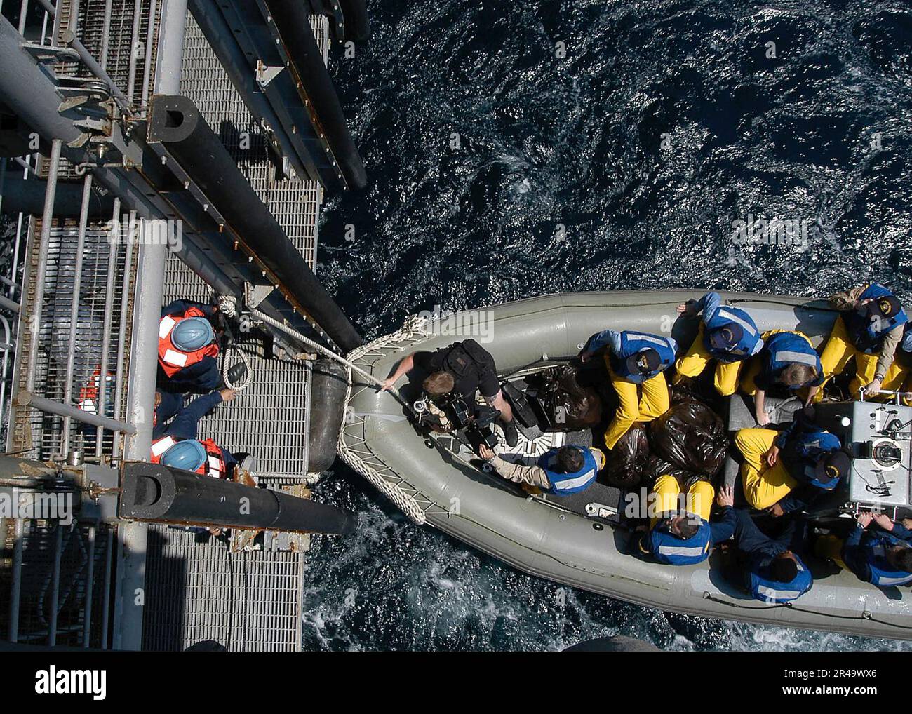 US Navy Crewmembers aboard USS George Washington (CVN 73) receive a ...