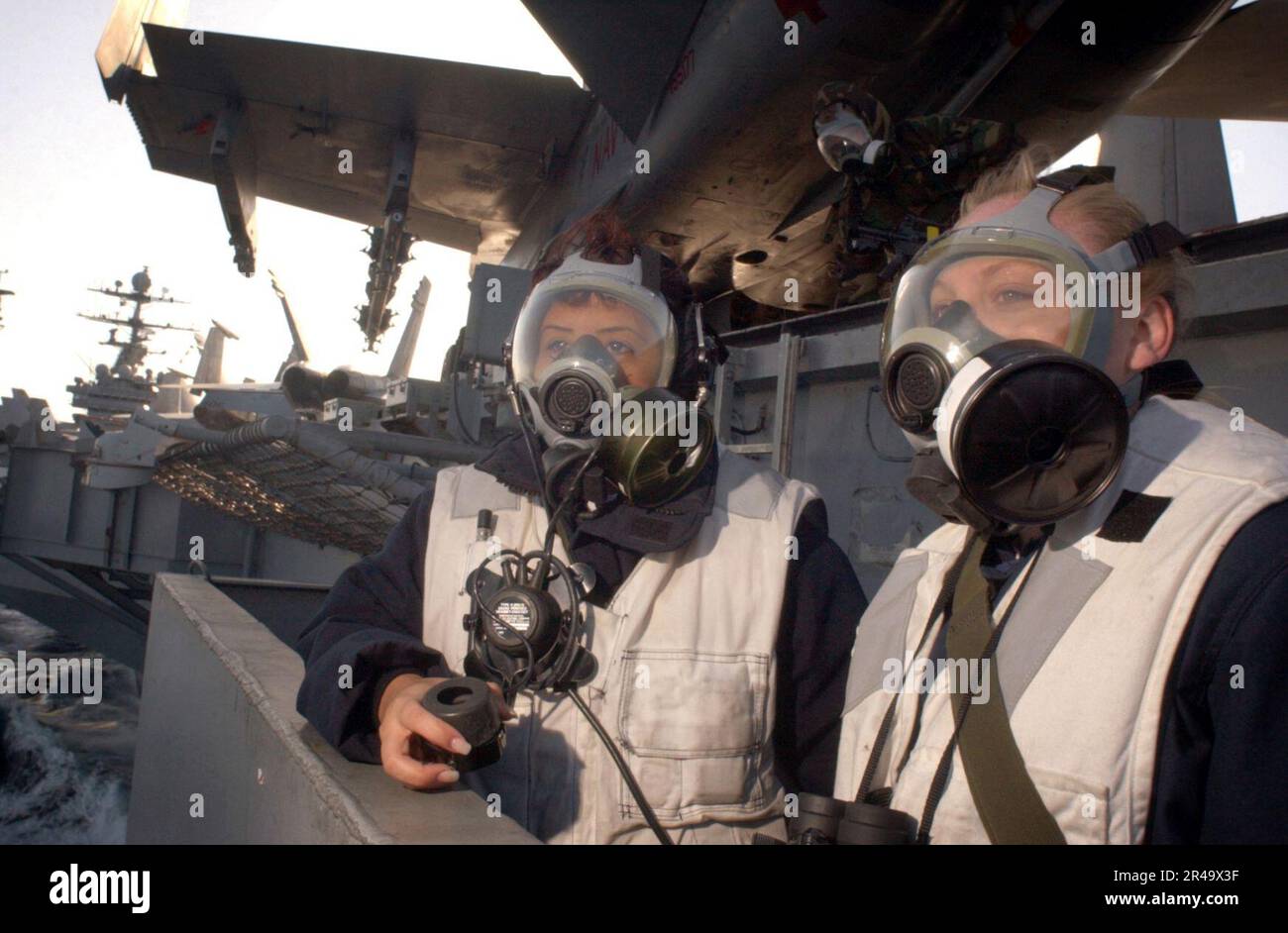 US Navy Operations Specialist Seaman stand the forward starboard ...