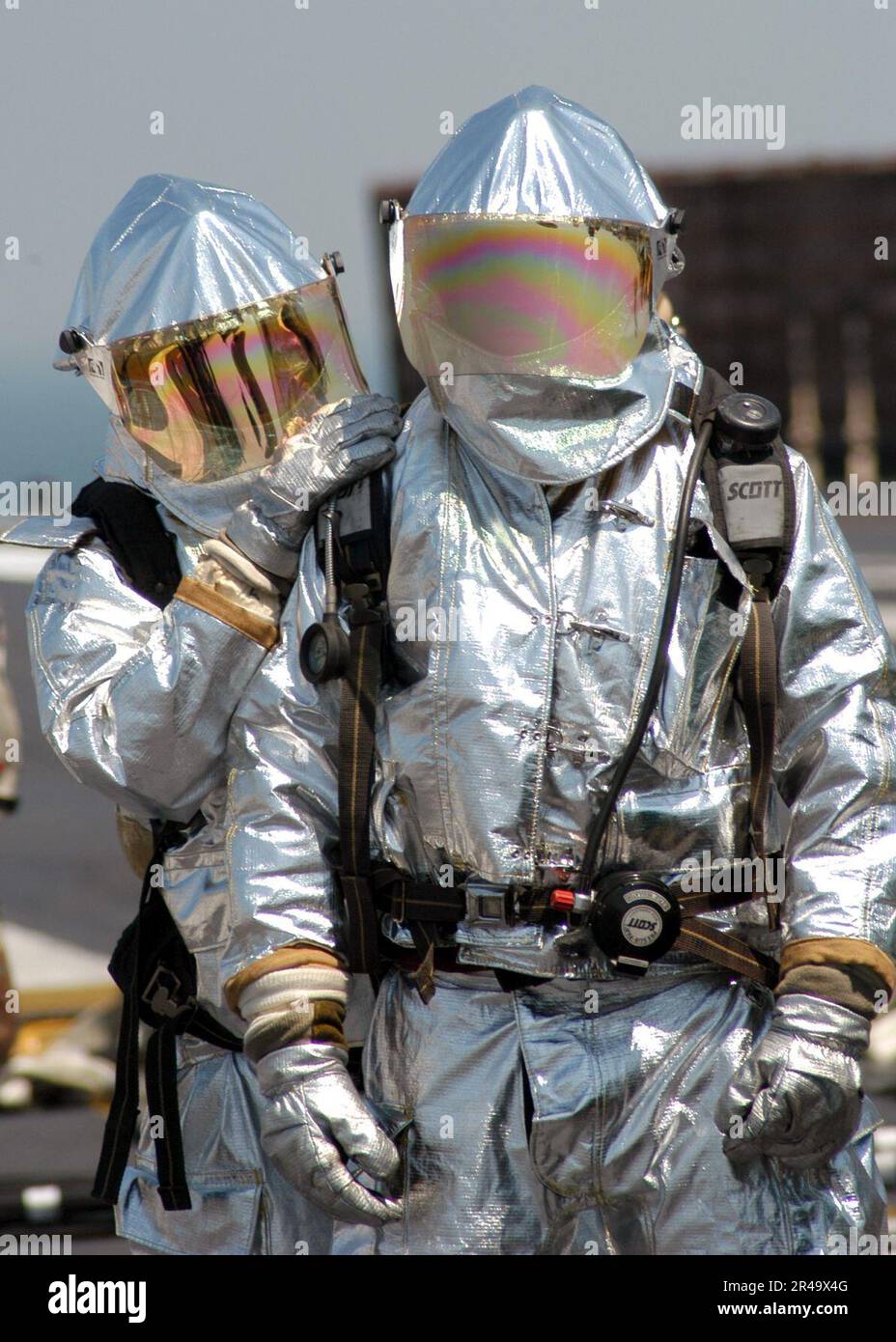 US Navy Members of the crash and salvage team aboard USS Enterprise ...