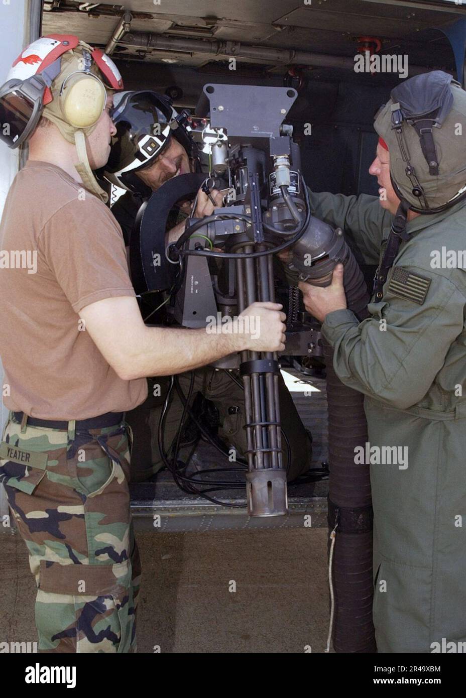 US Navy Sailors assigned to the Redwolves of Helicopter Combat Search ...