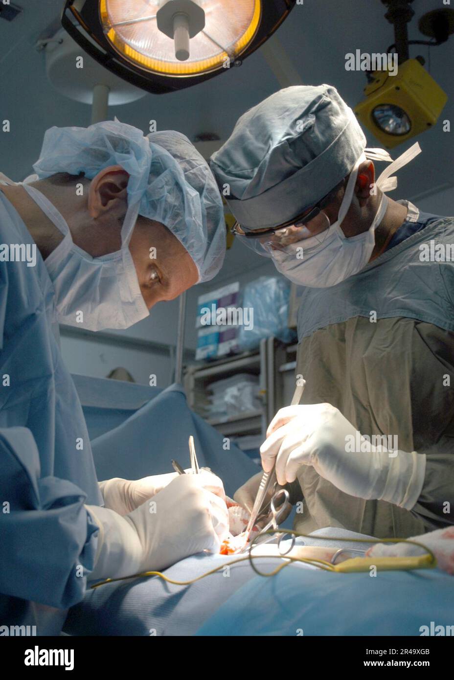 US Navy Cdr. a visiting Neurosurgeon, and Lt. Cdr. Ship's Surgeon ...