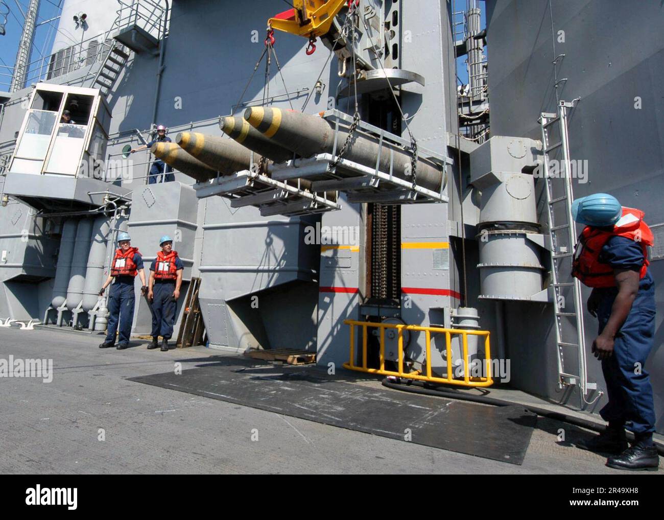 US Navy Deck department personnel aboard the fast combat support ship ...