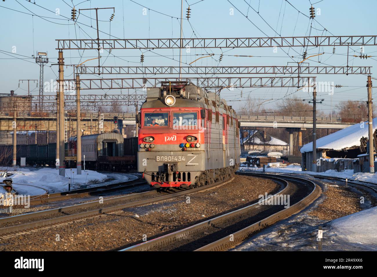 SHARYA, RUSSIA - MARCH 19, 2022: VL80S electric locomotive with a ...