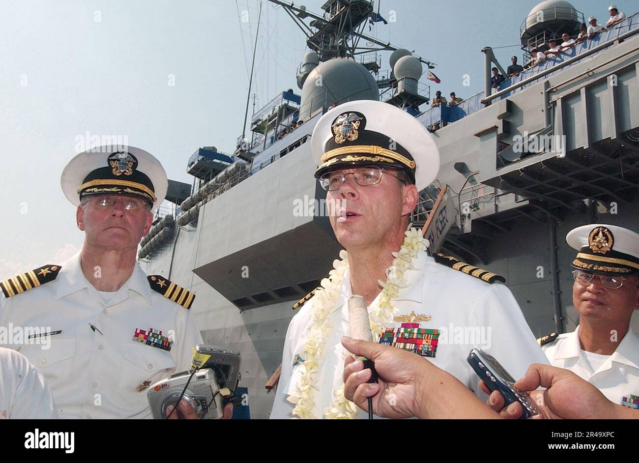 US Navy Capt. commanding officer USS Coronado (AGF 11), greets the ...