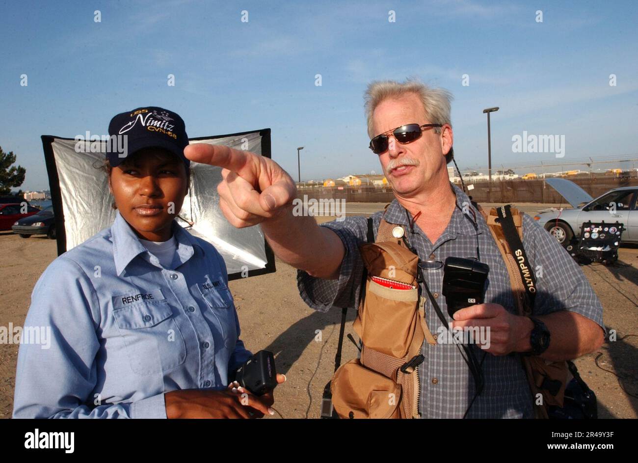 US Navy Photographer's Mate assigned to USS Nimitz (CVN 68), receives ...
