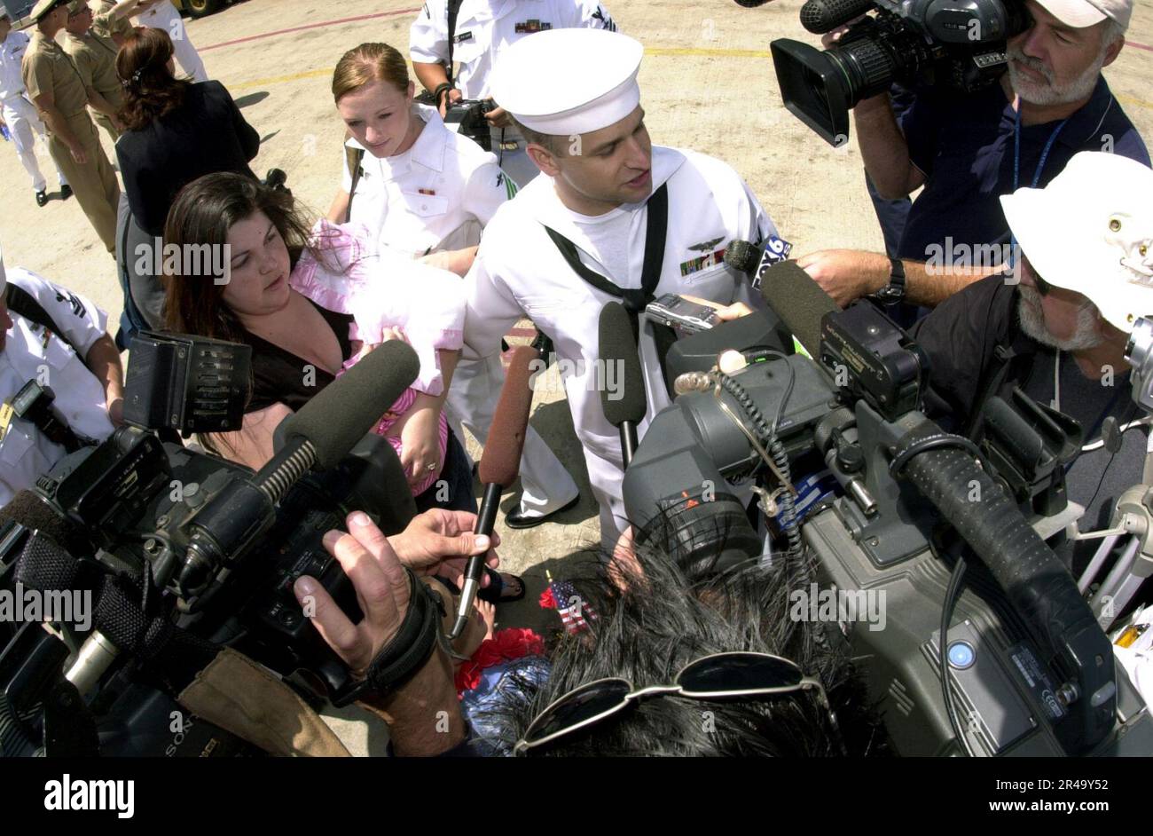 US Navy Aviation Ordnanceman 1st Class talks to reporters after ...