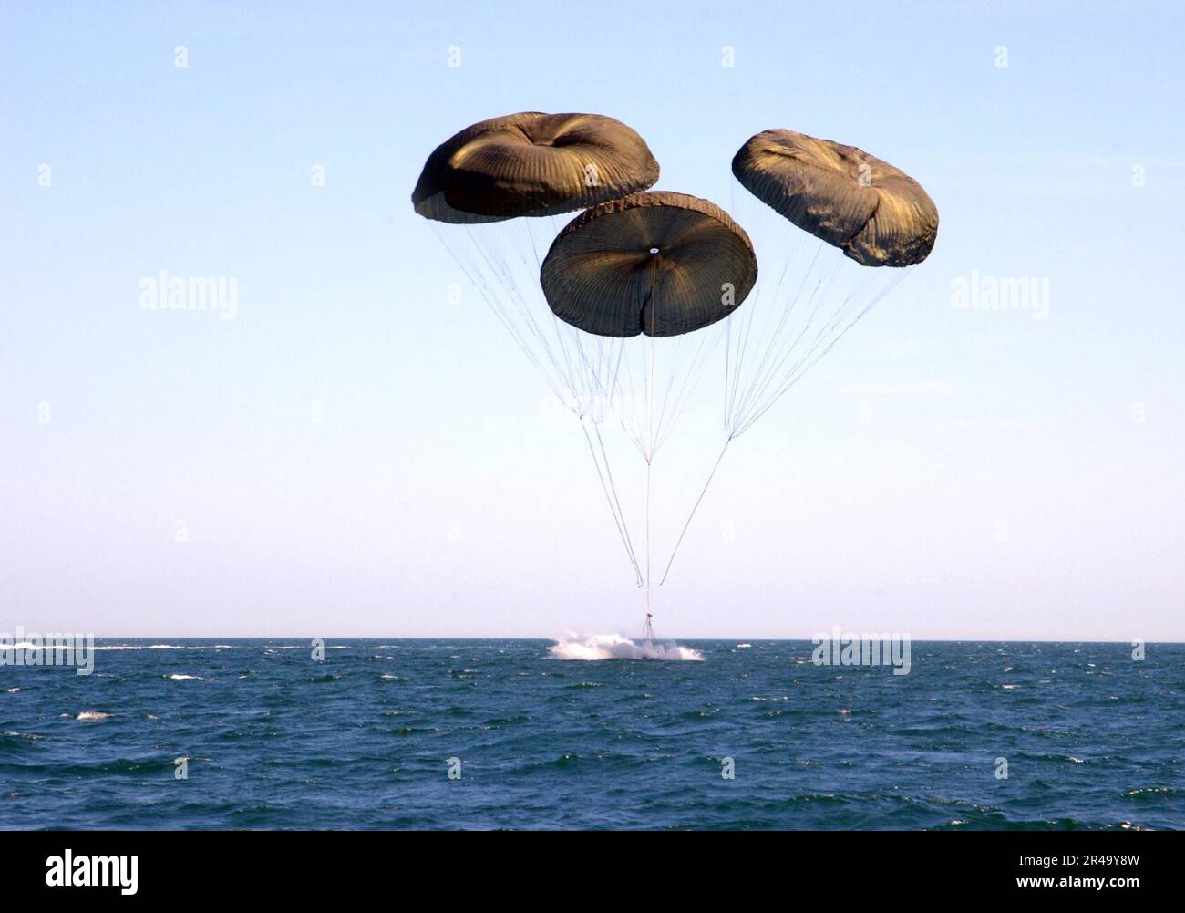 US Navy A Rigid Hull Inflatable Boat (RHIB) impacts the Atlantic Ocean ...