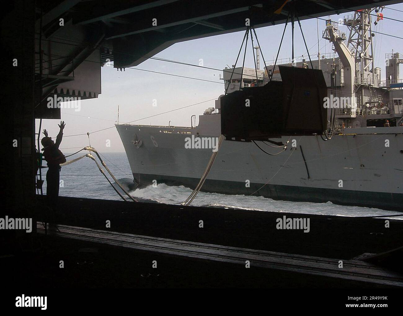 US Navy USS George Washington (CVN 73) receives food and supplies from ...
