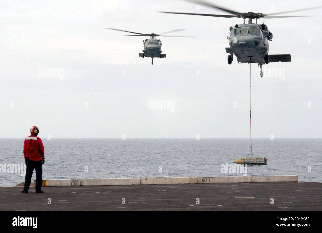 US Navy MH-60S Knighthawk helicopters assigned to the Dragon Whales of ...