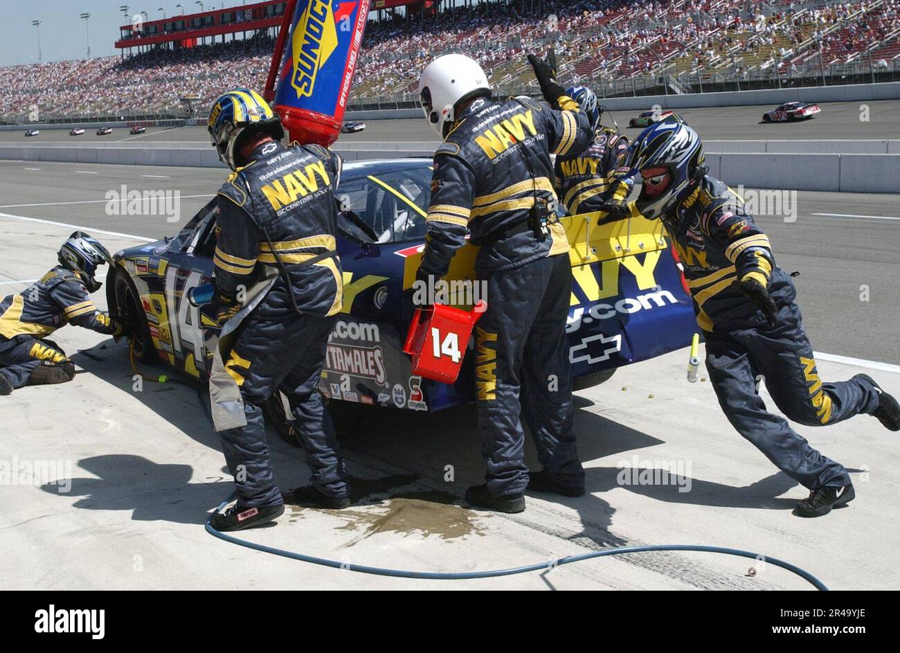 US Navy Members of the Navy sponsored NASCAR racing team pit crew ...