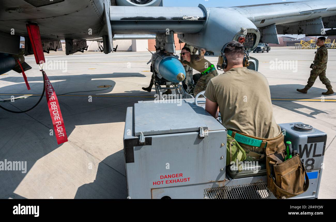 Weapons load crew members from the 25th Fighter Generation Squadron ...