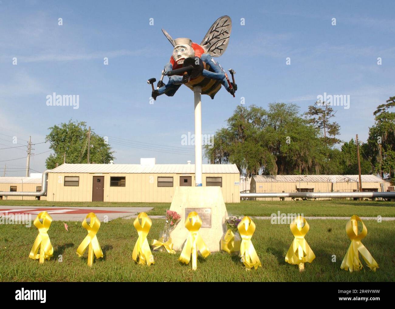US Navy Seven yellow ribbons symbolize the members of Naval Mobile ...