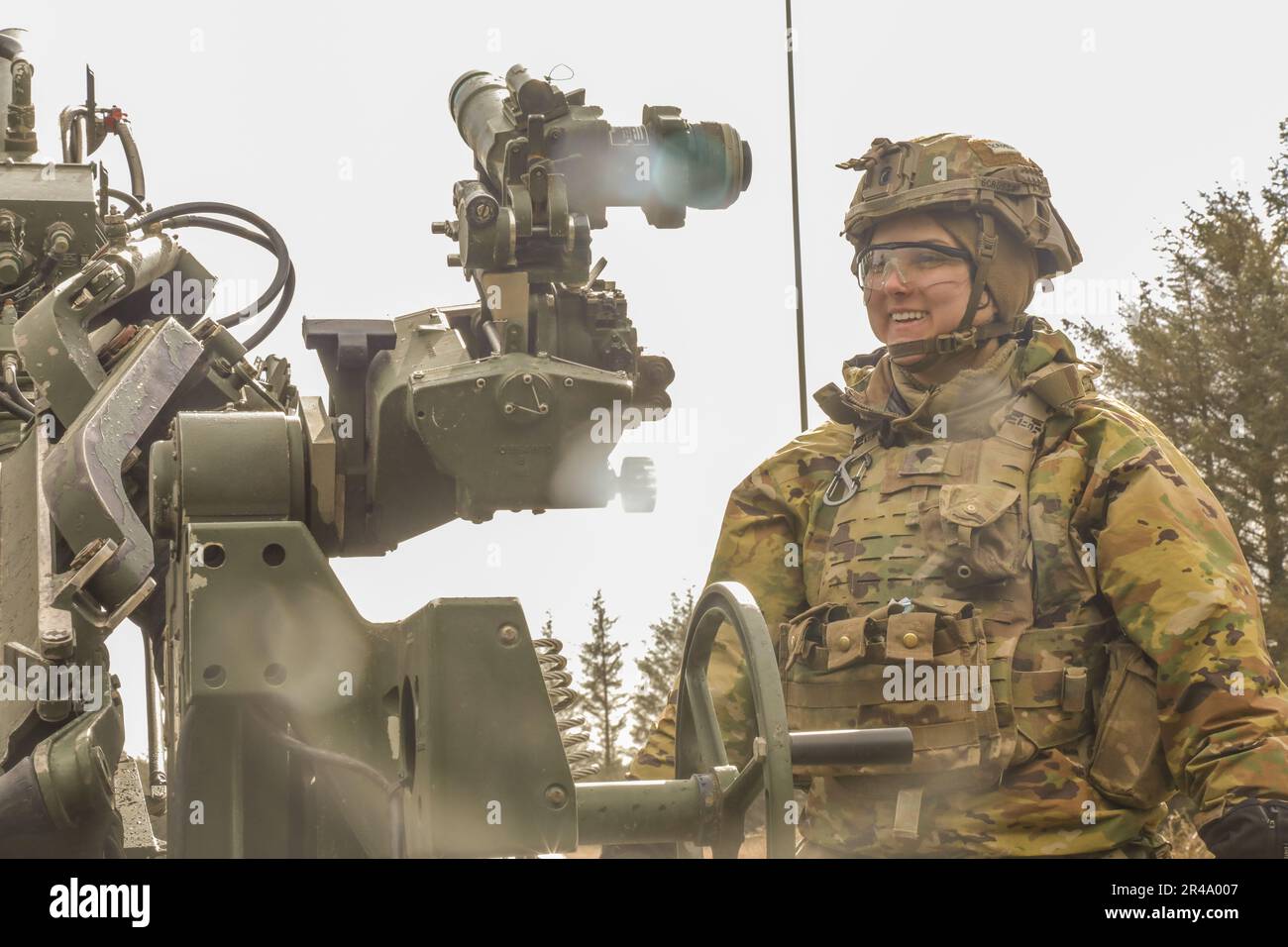 U.S. Army Spc. Christina L. Richardson, a cannon crewmember assigned to ...