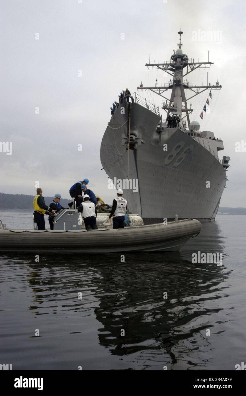 US Navy The crew of a Rigid Hull Inflatable Boat (RHIB) assigned to the ...