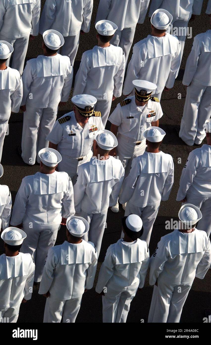 US Navy Sailors assigned to Fleet Activities Sasebo, Japan, stand ready ...