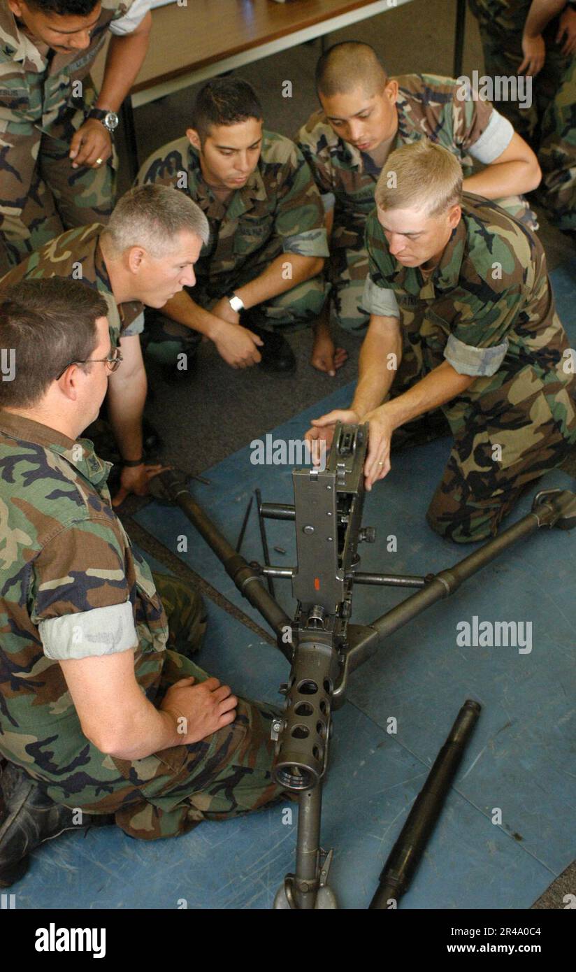 US Navy Sailors assigned to Naval Mobile Construction Battalion Two Two ...