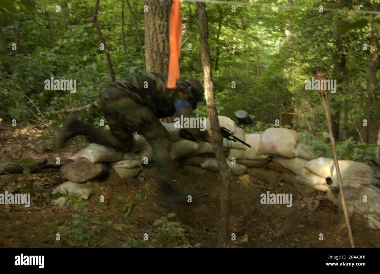 US Navy A Midshipman takes cover during a simulated amphibious assault ...
