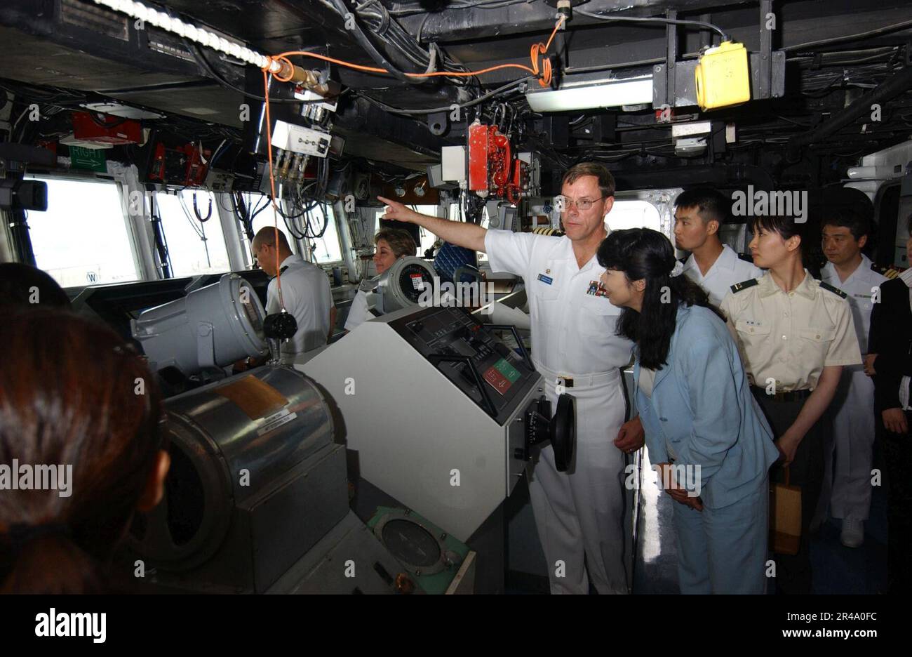 US Navy Commanding Officer Capt. USS Coronado (AGF 11), describes the state-of-the-art equipment ...