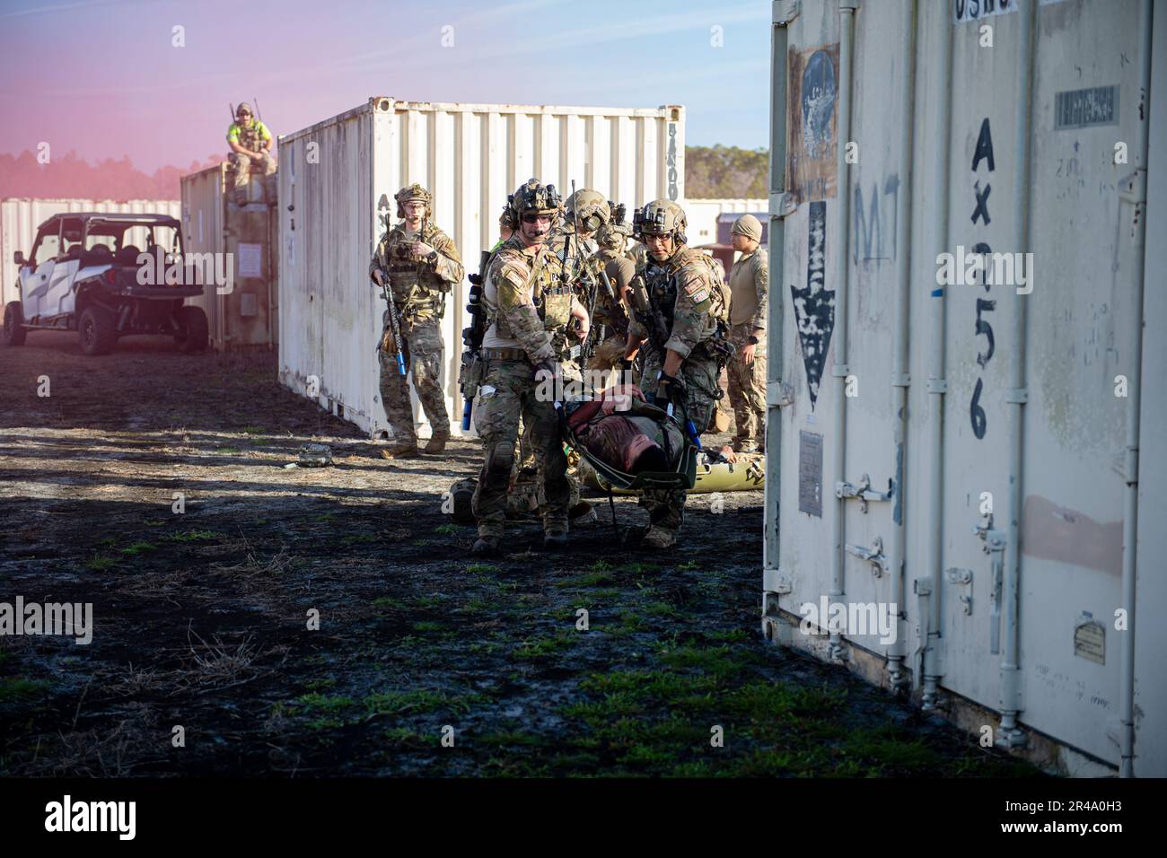 U.S. Air Force Pararescuemen from the 38th Rescue Squadron move a ...