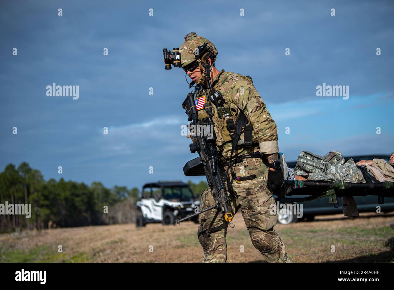 A U.S. Air Force Pararescueman from the 38th Rescue Squadron carries a ...