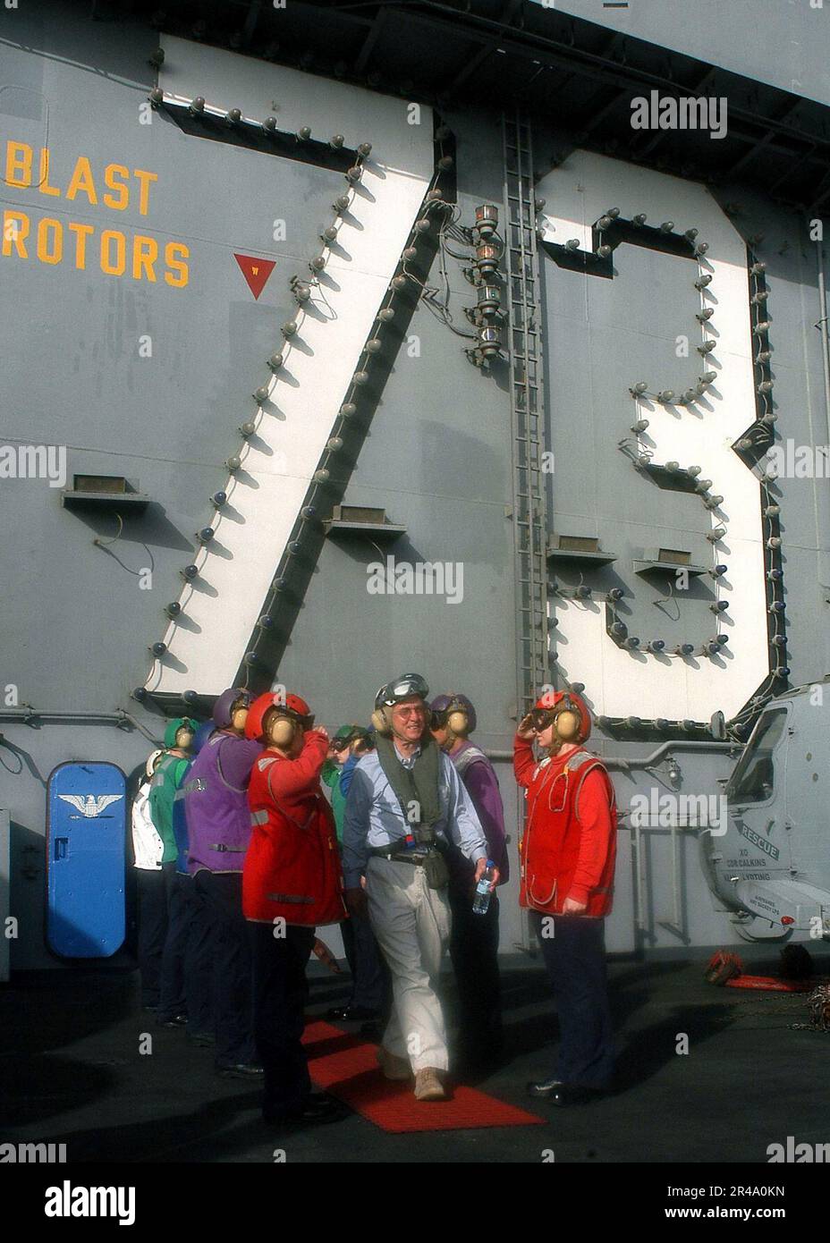 US Navy Secretary of the Navy, Gordon R. England, passes through the ...