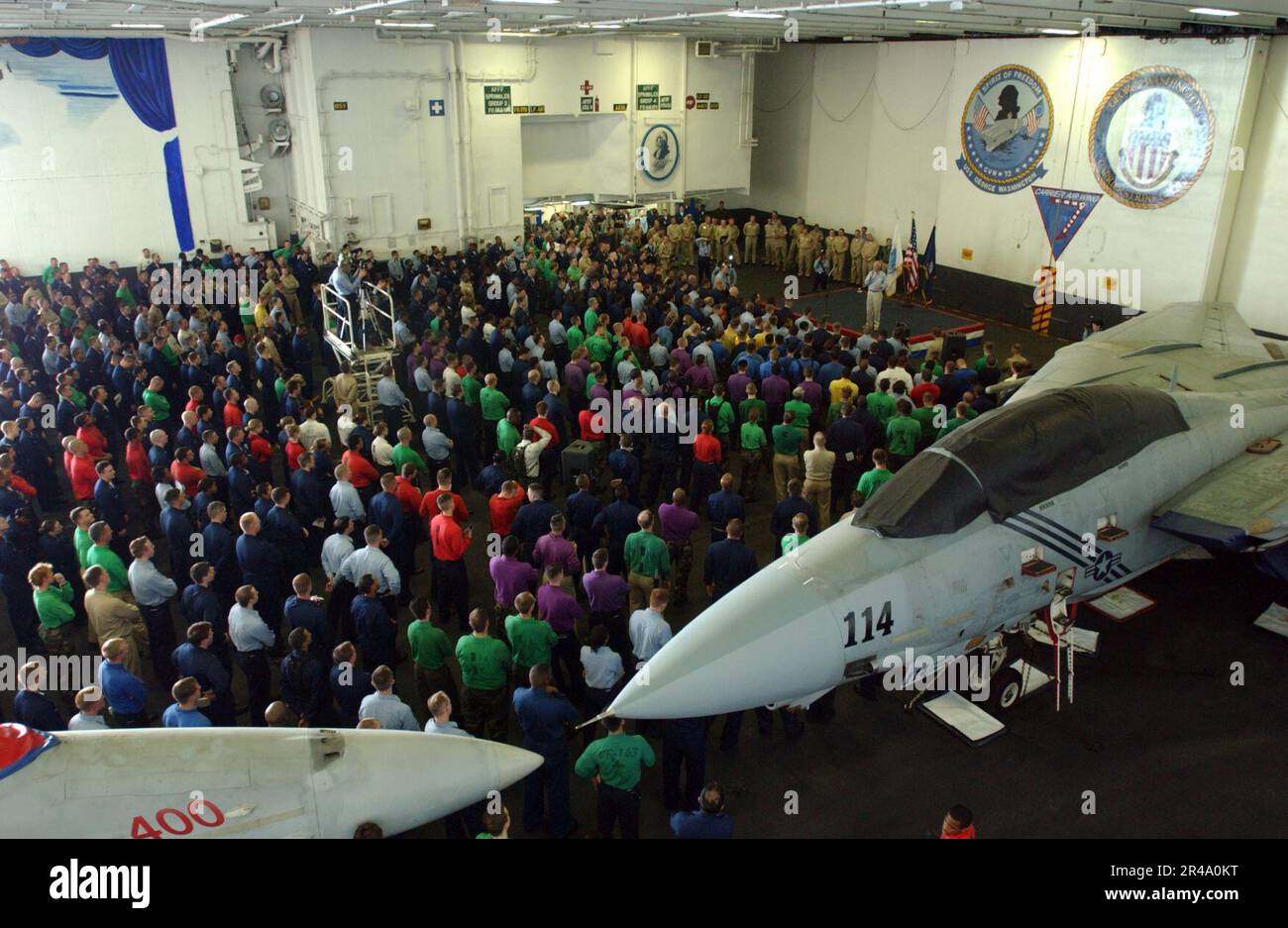 US Navy Secretary of the Navy, Gordon R. England, speaks with assembled ...