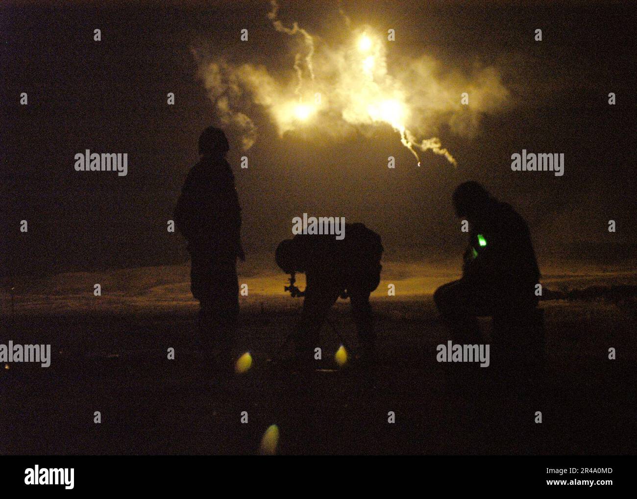 US Navy Illumination rounds silhouette Navy Reserve Seabees assigned to ...