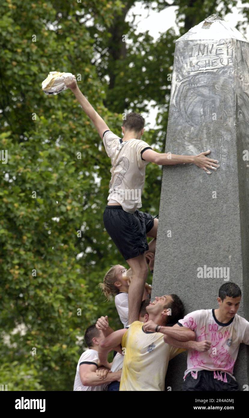 US Navy Midshipman Fourth Class Philip Johnson falls from the top of ...