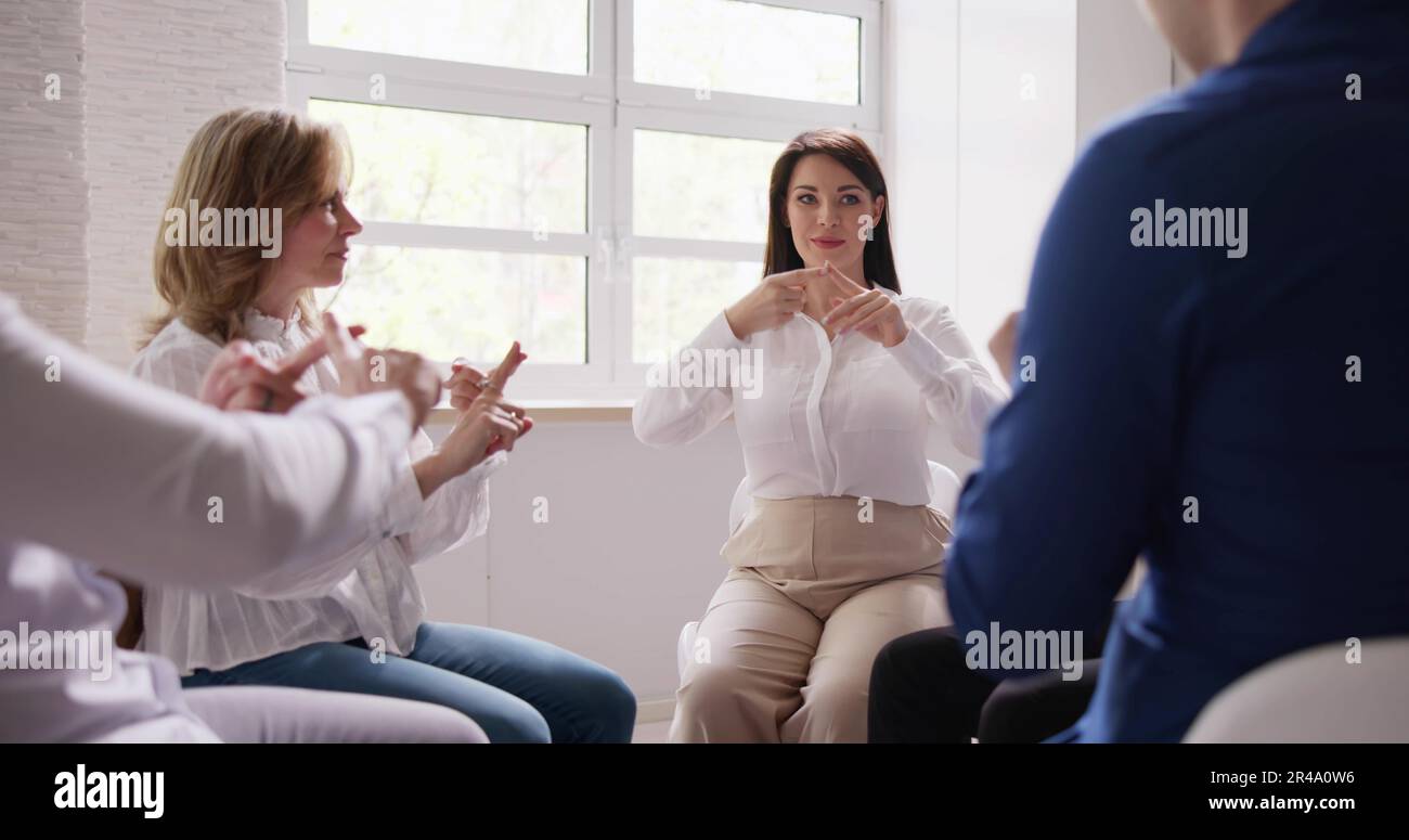 Sign Language Learning For Deaf People With Disabilities Stock Photo ...