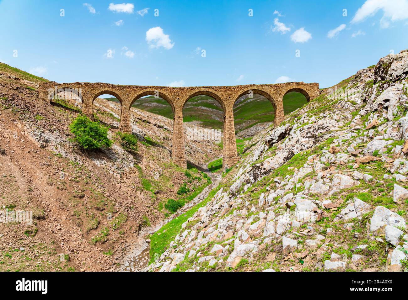 An ancient stone bridge in the suburbs of the city of Gadabay, built by ...