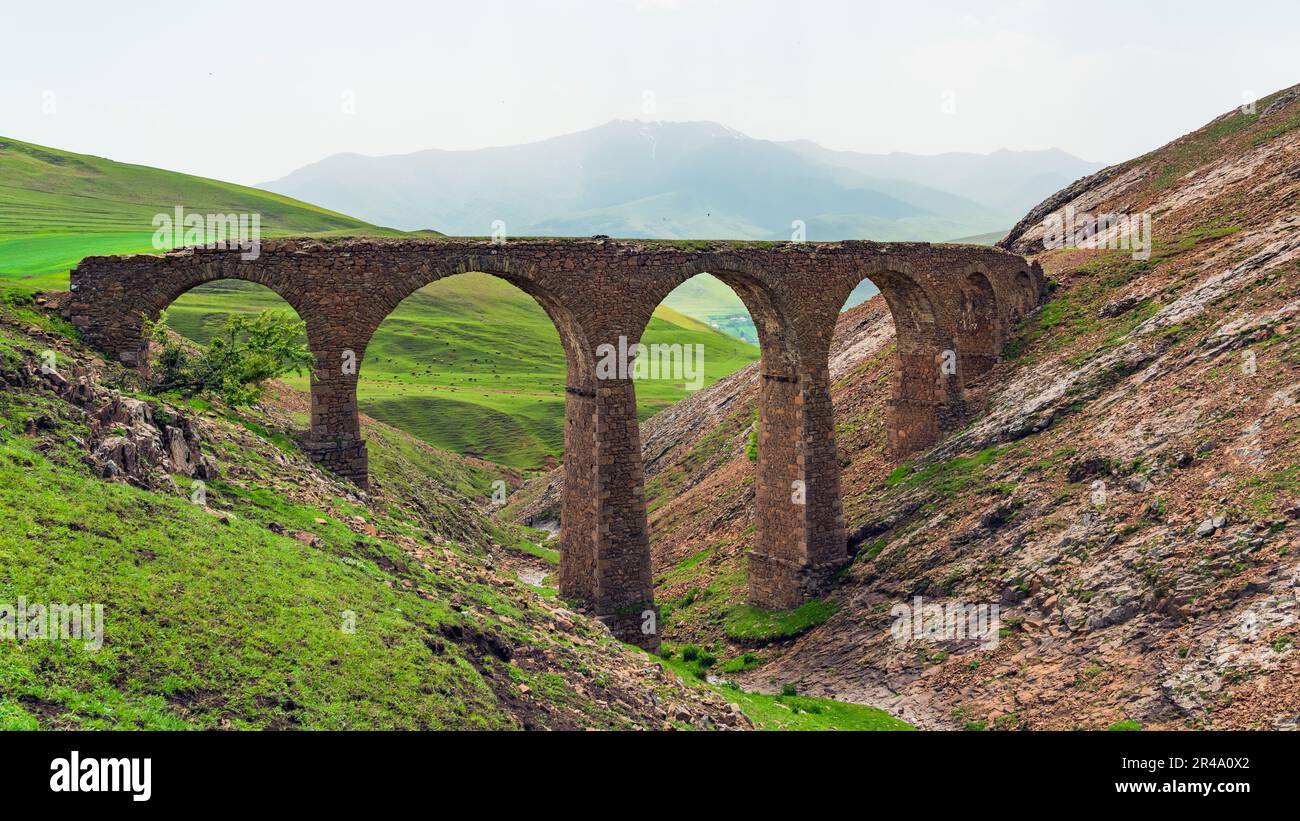 An ancient stone bridge in the suburbs of the city of Gadabay, built by ...