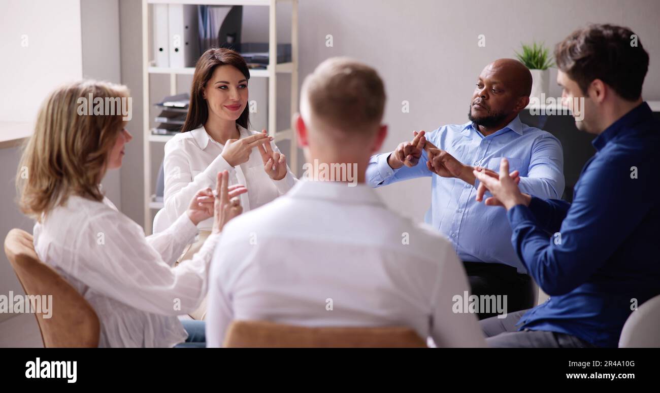 Sign Language Learning For Deaf People With Disabilities Stock Photo ...