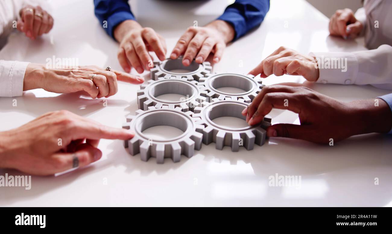 Diverse People Hands Holding Gear Wheels. Business Partnership Stock ...