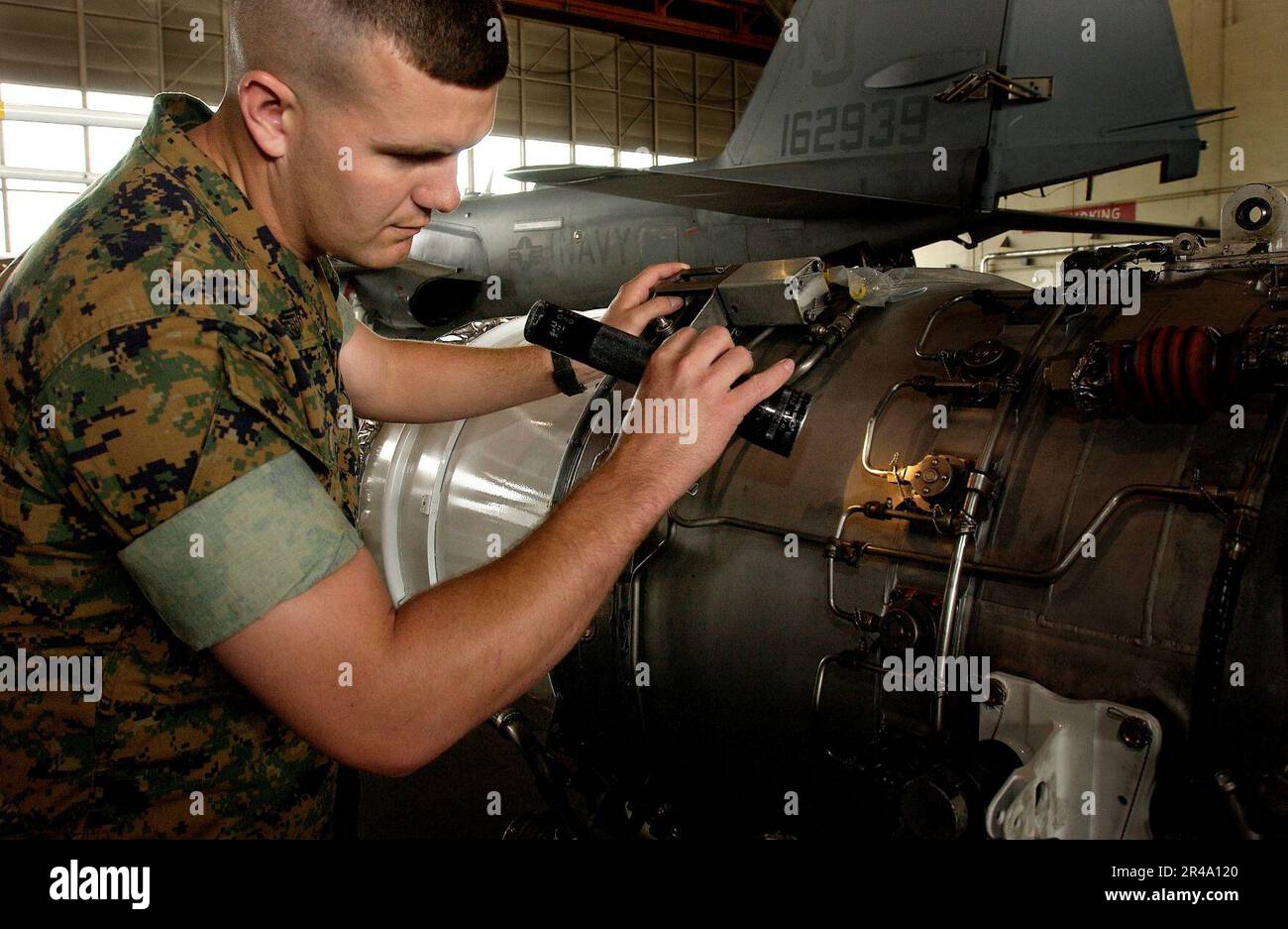 US Navy U.S. Marine Corps Staff Sgt. inspects an EA-6B Prowler Pratt ...