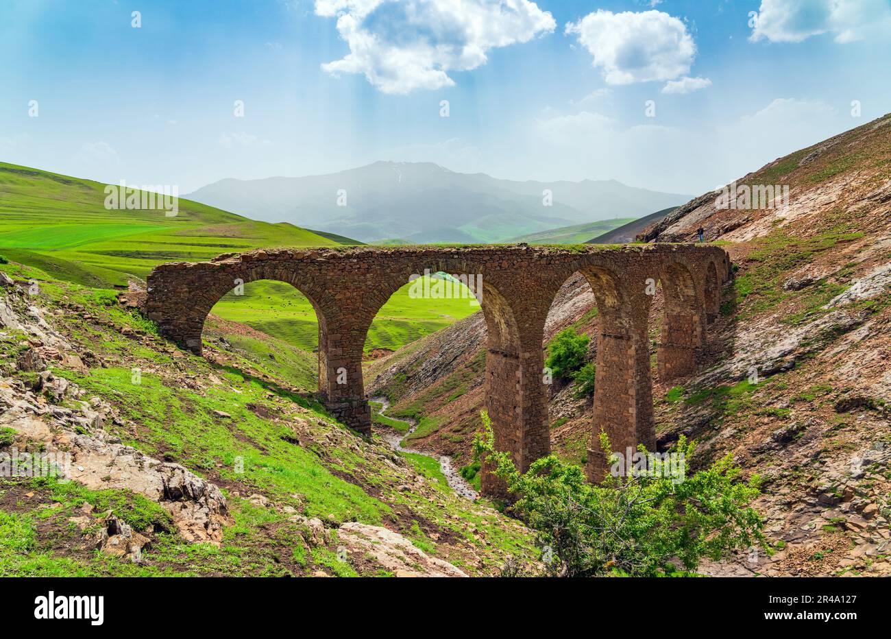 An ancient stone bridge in the suburbs of the city of Gadabay, built by ...