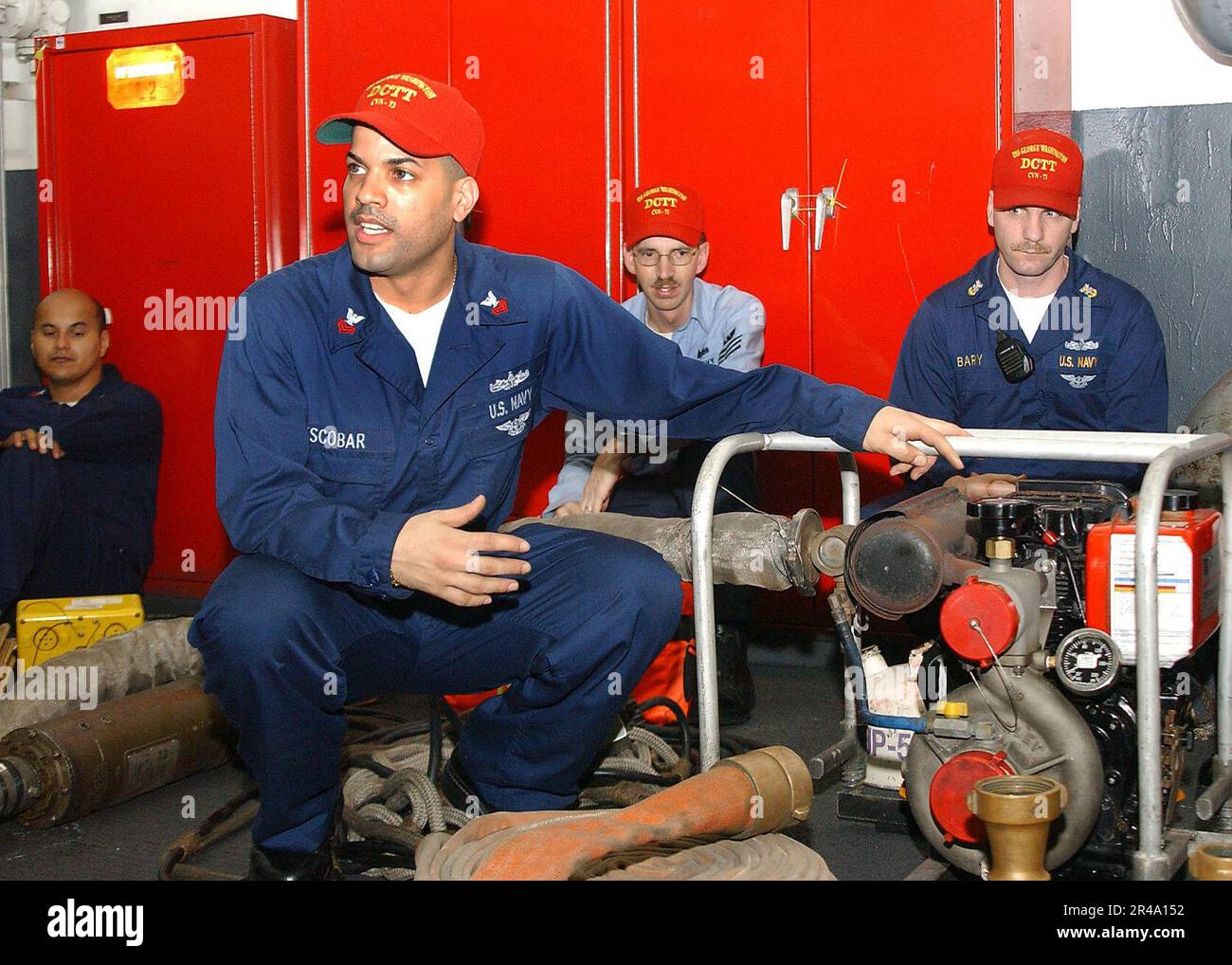 US Navy Damage Controlman 1st Class trains Damage Control Training Team ...