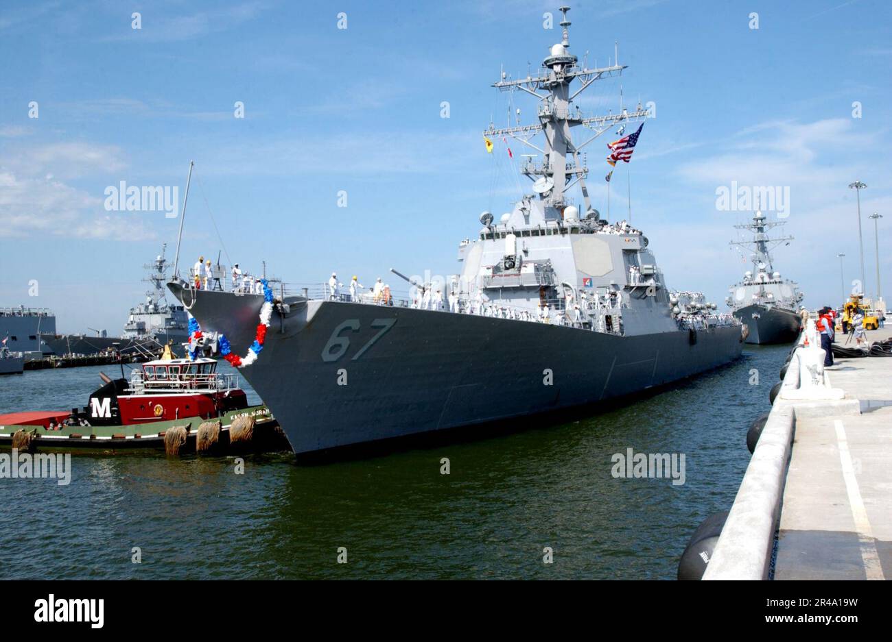 US Navy Guided missile destroyer USS Cole (DDG 67) prepares to moor ...