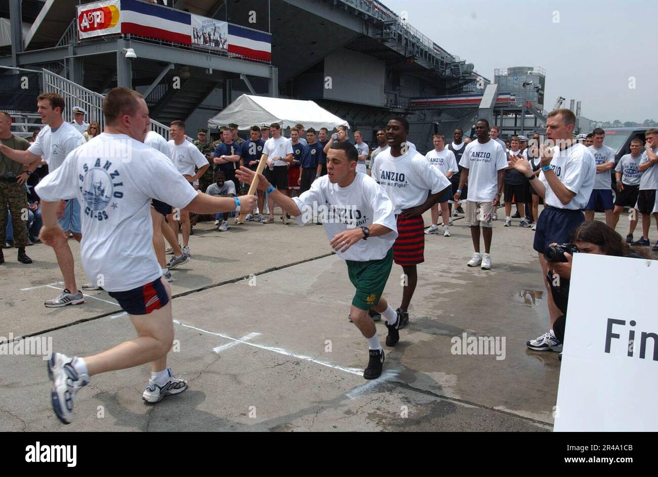 US Navy A Sailor assigned to the guided missile cruiser USS Anzio (CG ...