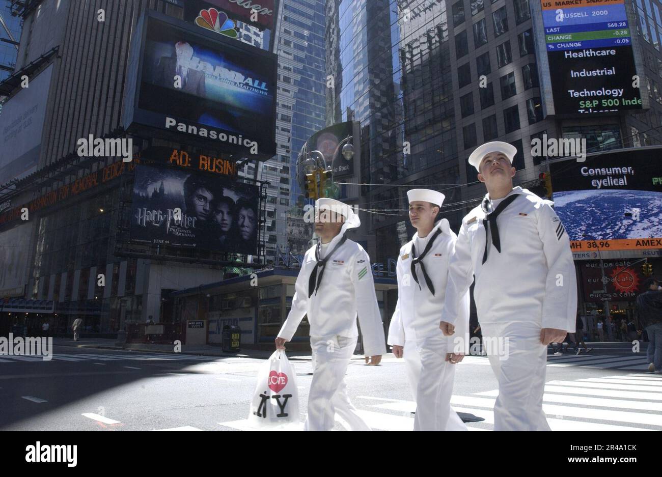 US Navy Sailors take in the sights on a windy day in Times Square ...