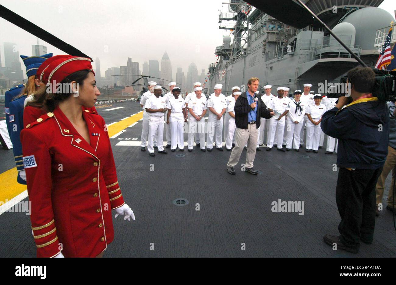 US Navy Steve Doocy of Fox News, interviews Sailors assigned to the ...
