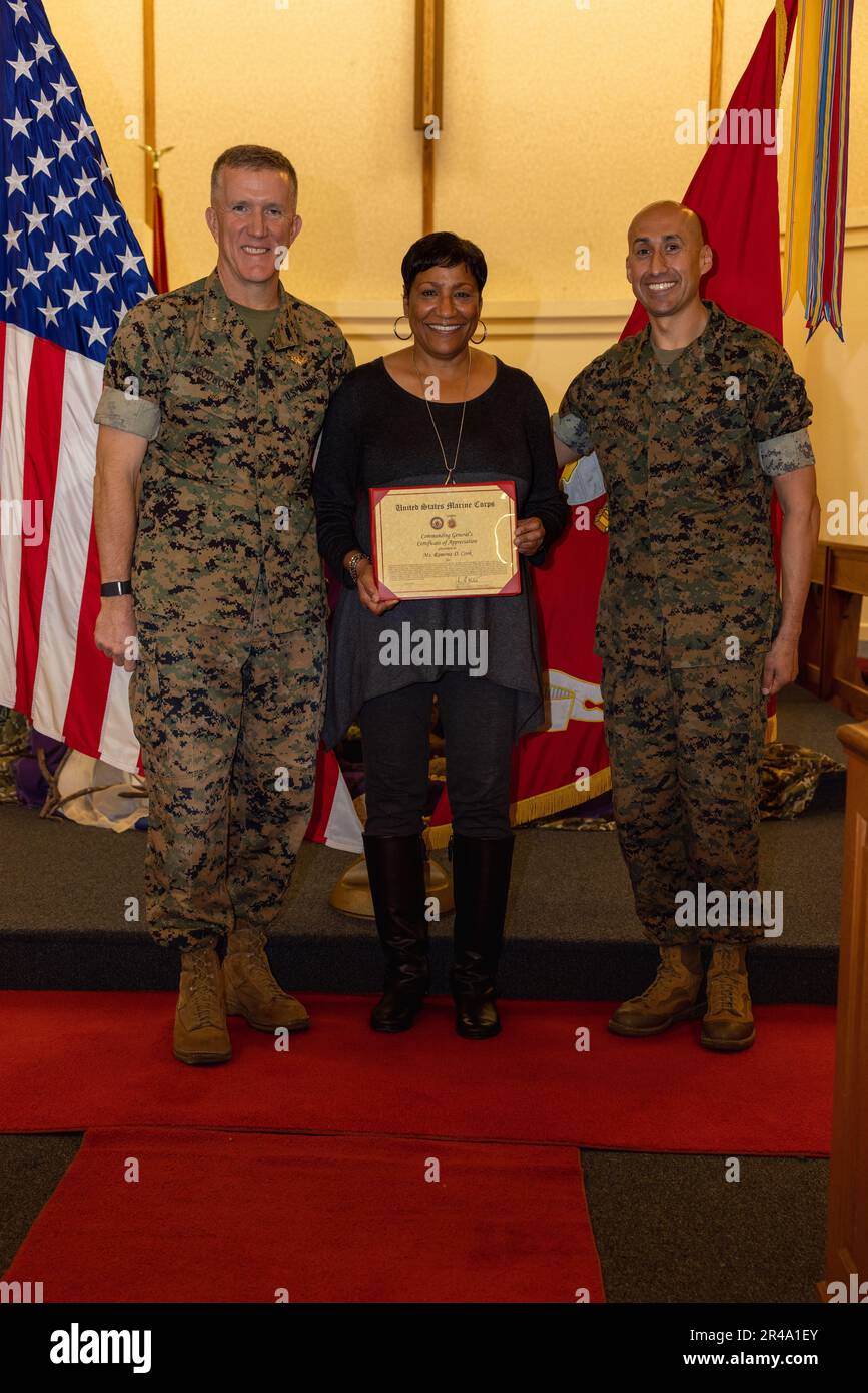 U.S. Marine Corps Brig. Gen. Jason G. Woodworth, left, the commanding ...