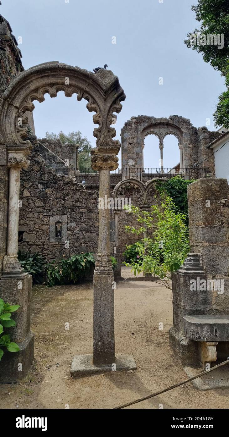 An idyllic archway frames the entrance to an ancient and beautiful ...