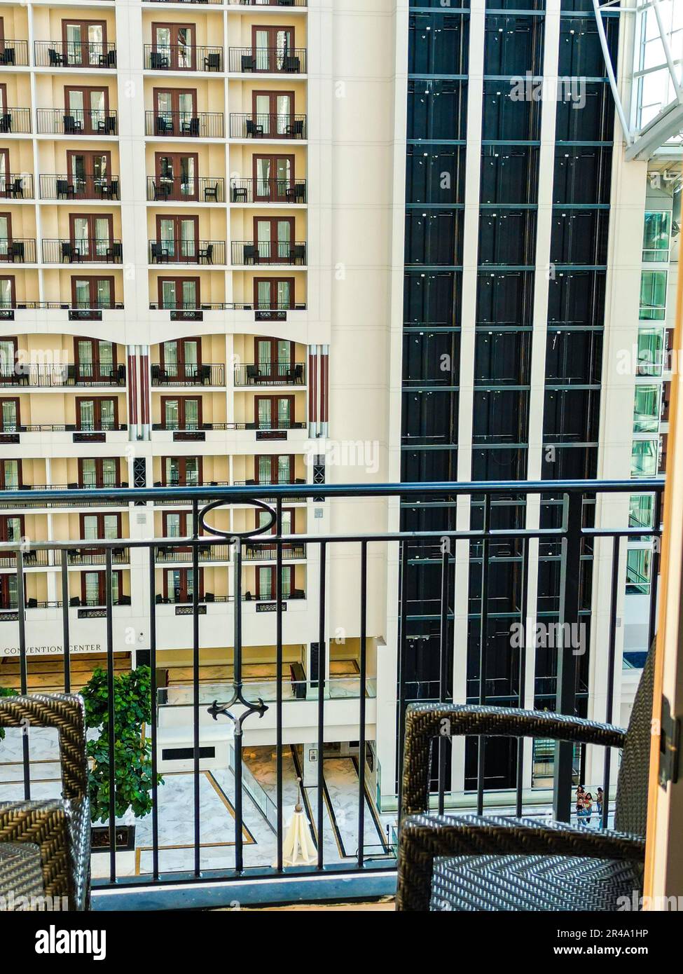 View of a tall modern building from a balcony Stock Photo - Alamy