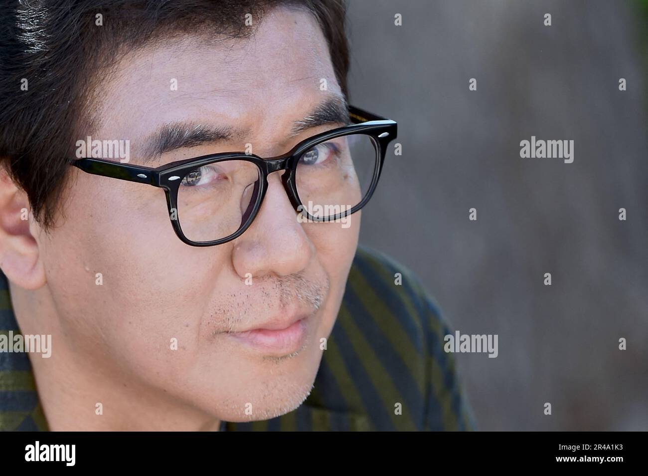 Cannes, France. 26th May, 2023. Kim Ji woon attends the Cobweb (Dans La ...