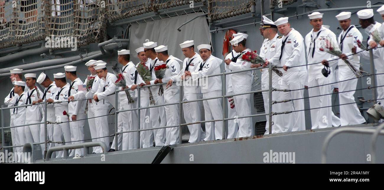 US Navy Sailors man the rails awaiting liberty call aboard the ...
